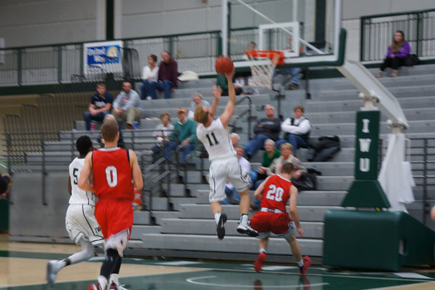 Titans use early 3s to roll past MacMurray | WJBC AM 1230